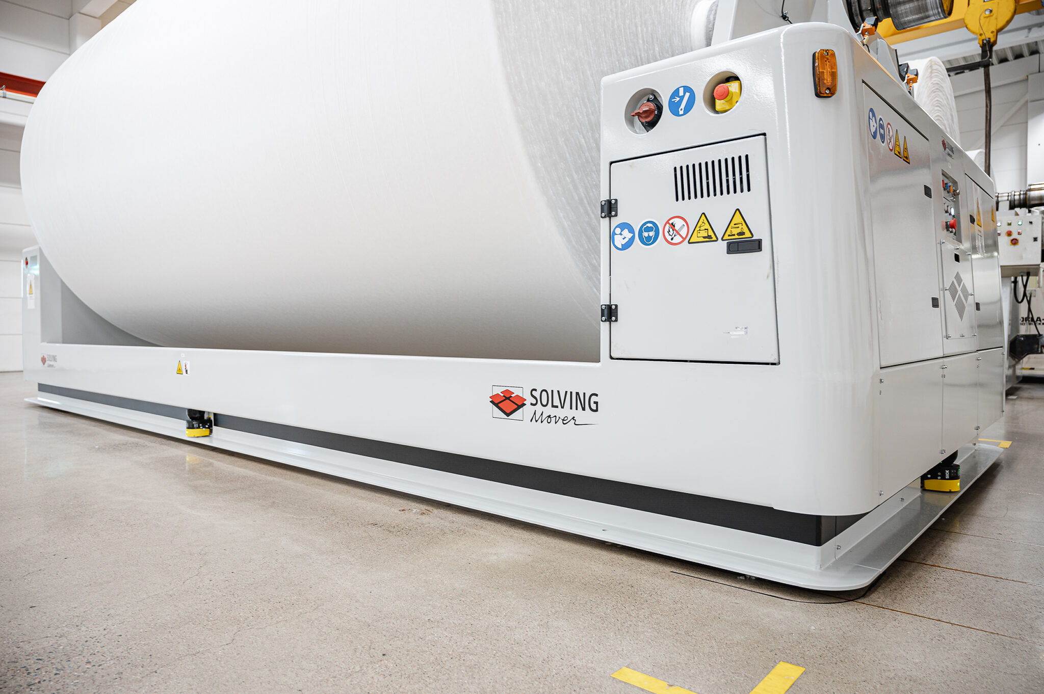 Roll handling systems & Automated paper roll movers | Solving